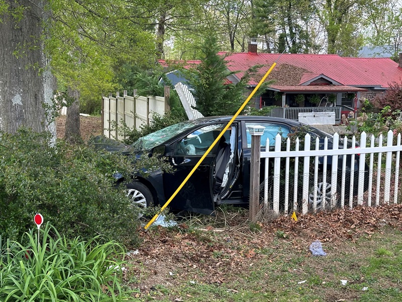 Driver injured as car smashes through fence and slams into tree - Now ...