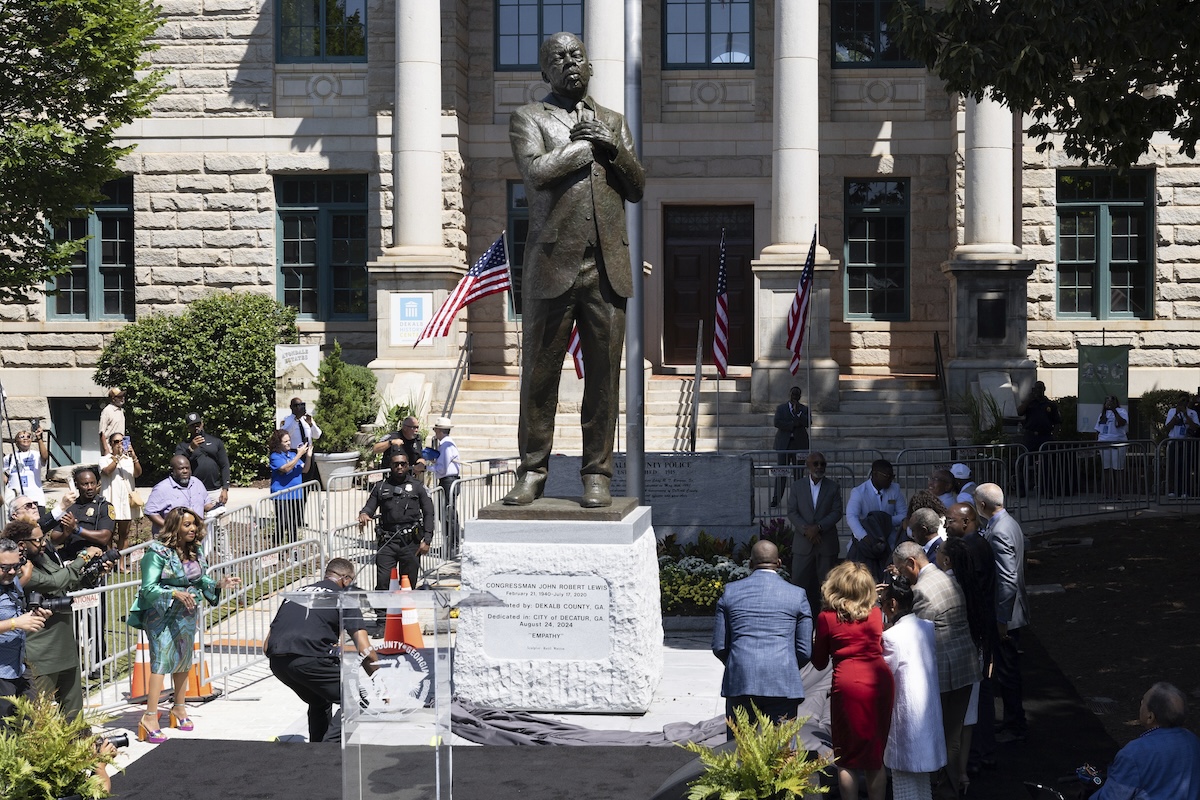 Crowd on hand for unveiling of John Lewis statue at spot where ...