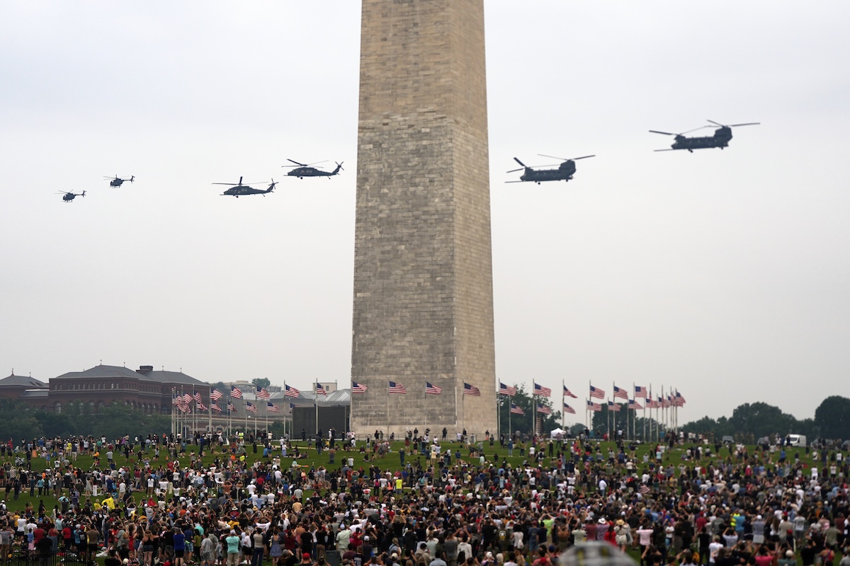 Military parade barrels through nation's capital with tanks, troops and ...