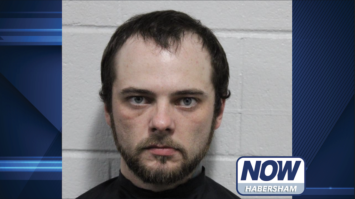 Man arrested on drug charges after leaving bag in bathroom